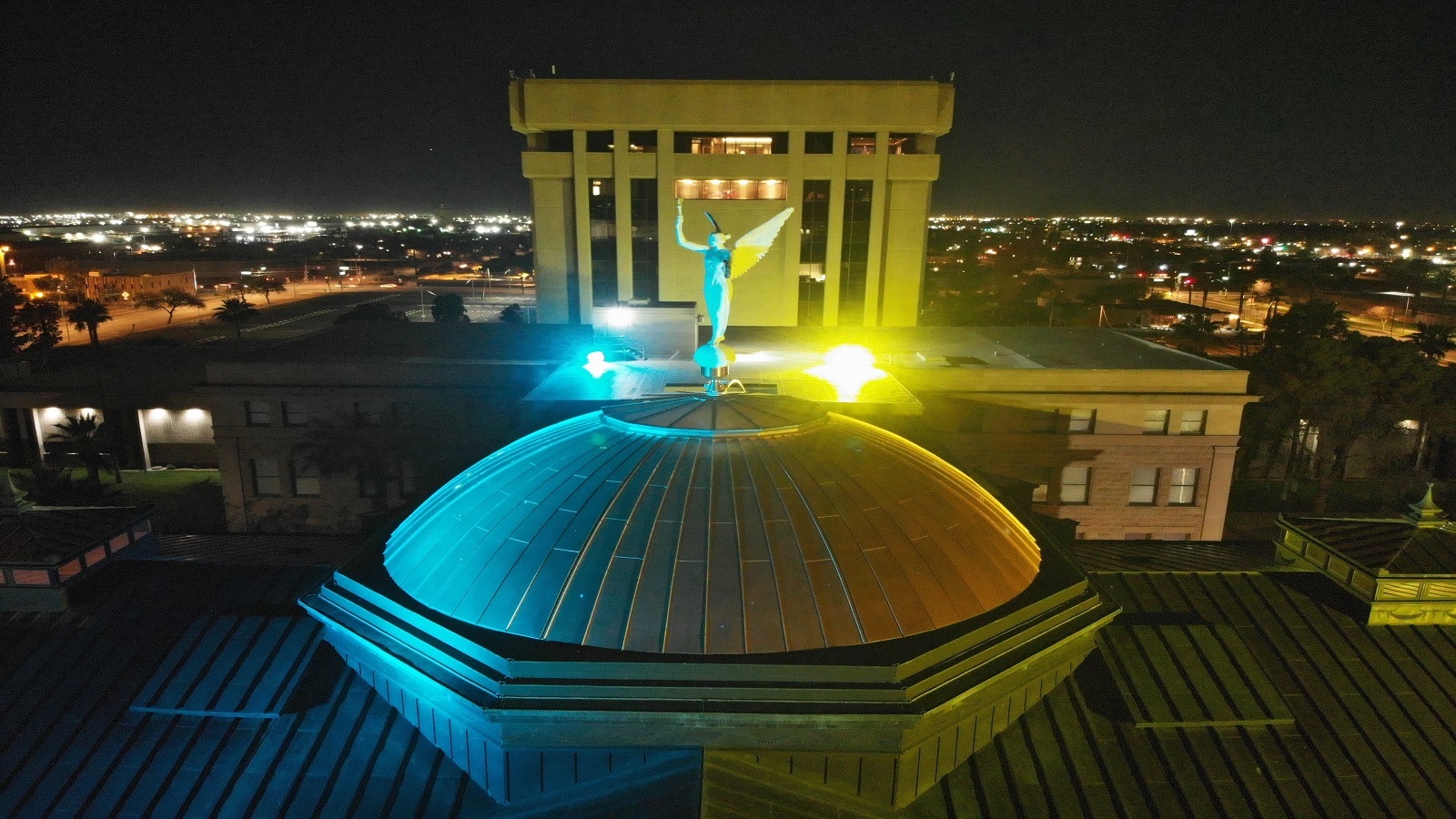 Arizona State Capitol lights up in yellow, blue to represent solidarity ...